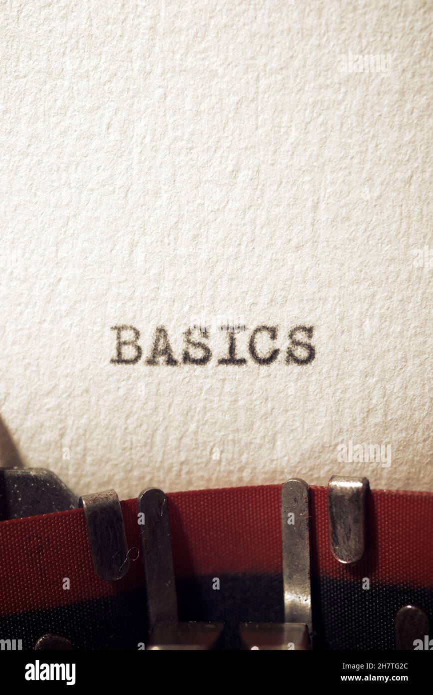 The word basics written with a typewriter Stock Photo - Alamy