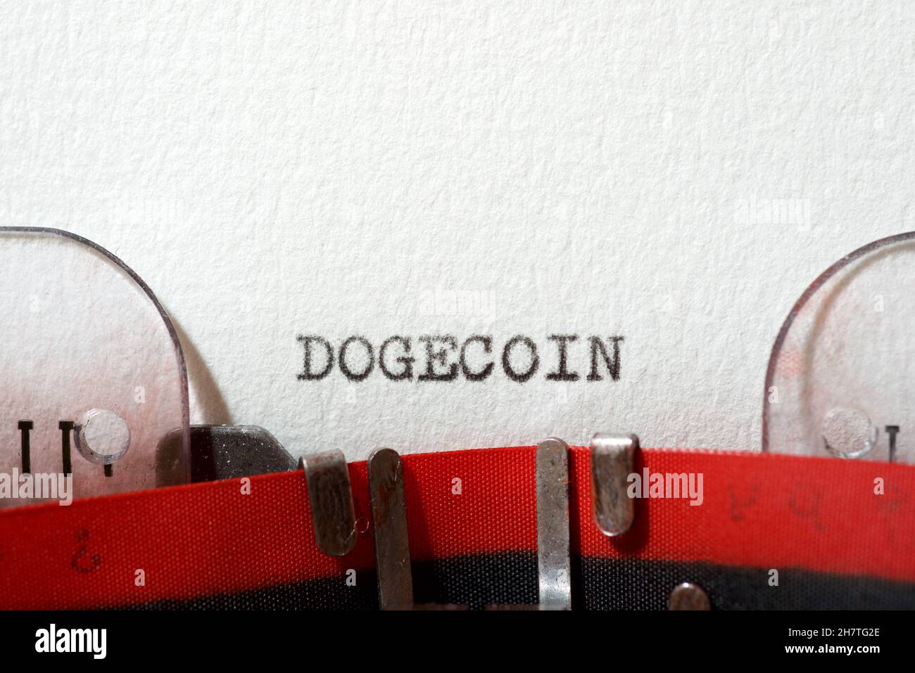 The word dogecoin written with a typewriter Stock Photo - Alamy