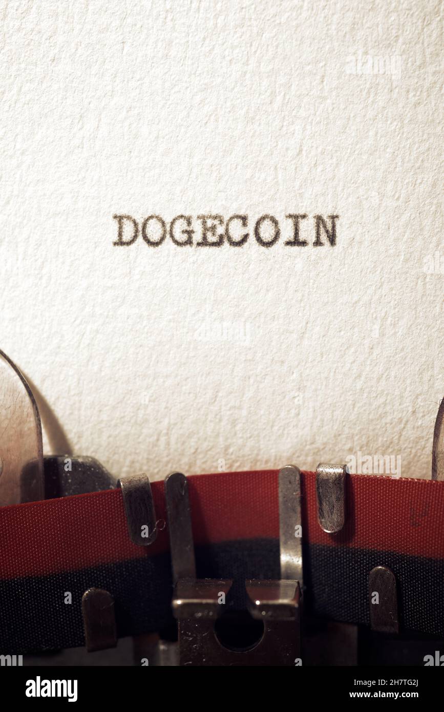 The word dogecoin written with a typewriter Stock Photo - Alamy