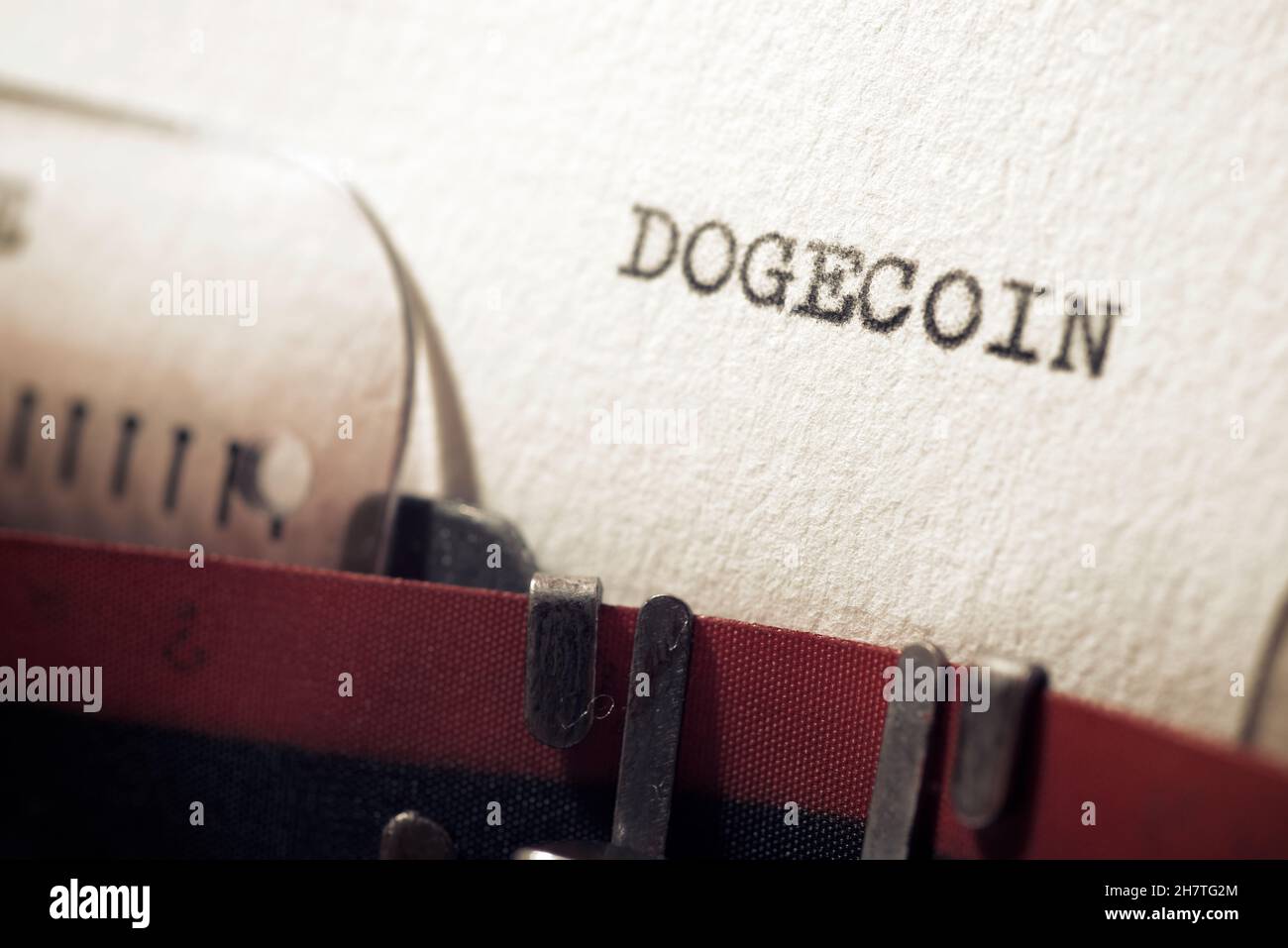 The word dogecoin written with a typewriter Stock Photo - Alamy