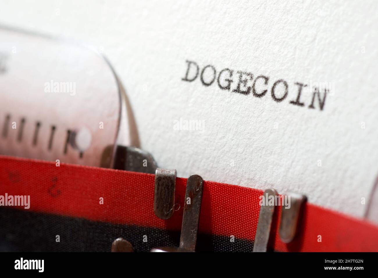 The word dogecoin written with a typewriter Stock Photo - Alamy