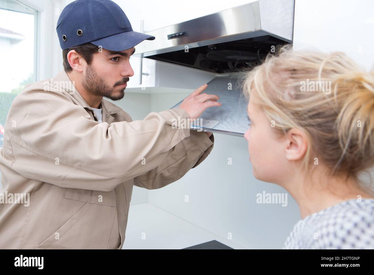 Woman talking home contractor hi-res stock photography and images - Alamy