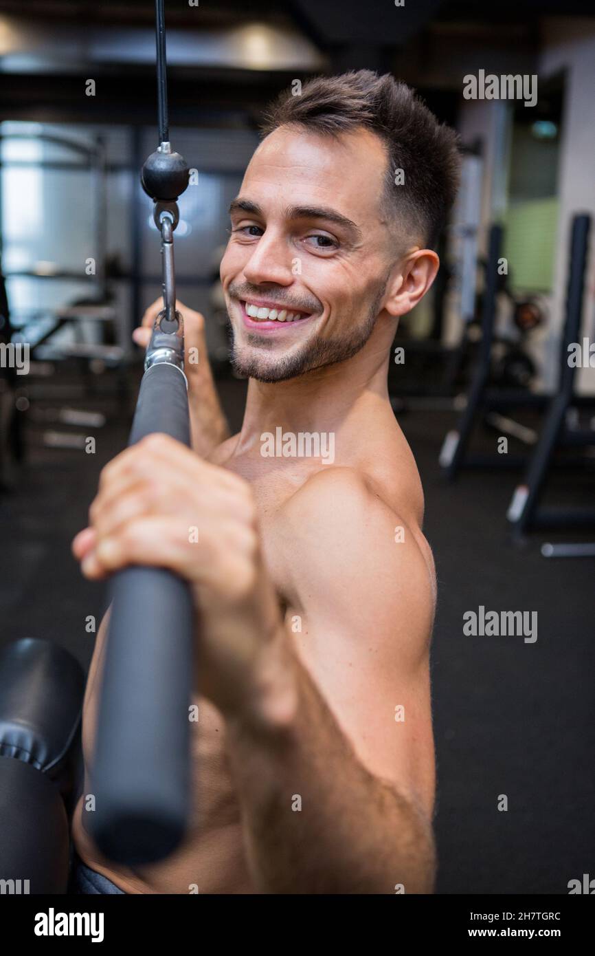 portrait of young smiling bodybuilder Stock Photo - Alamy