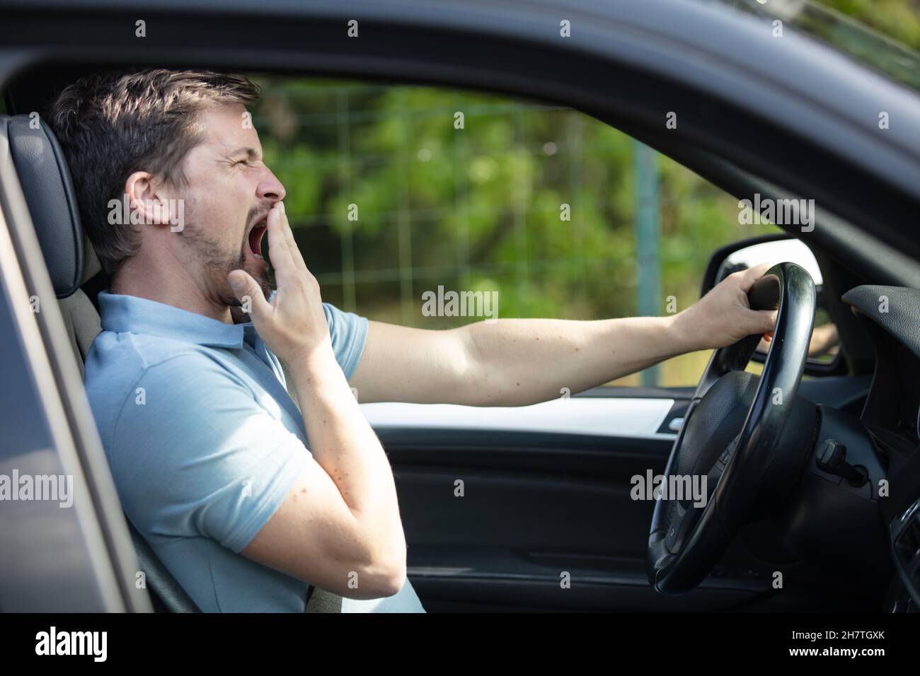 bored man in car waiting in traffic jam Stock Photo - Alamy