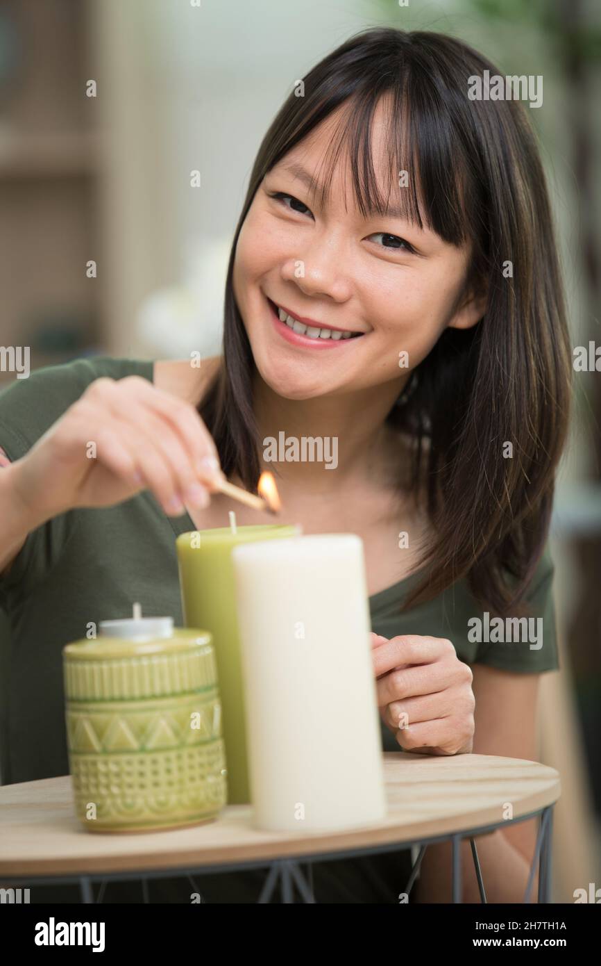Woman candles bedroom hi-res stock photography and images - Alamy
