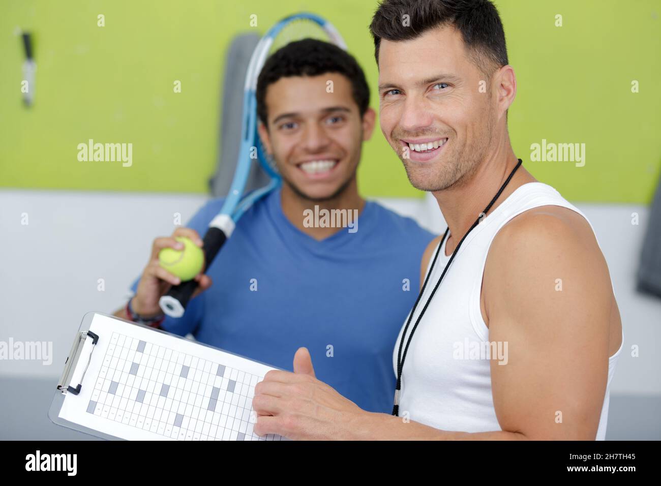 a sport coach and tennis player - lifestyle concept Stock Photo - Alamy