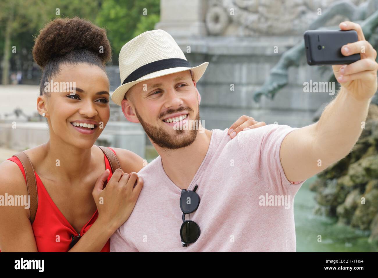 couple at times square taking selfie picture Stock Photo - Alamy
