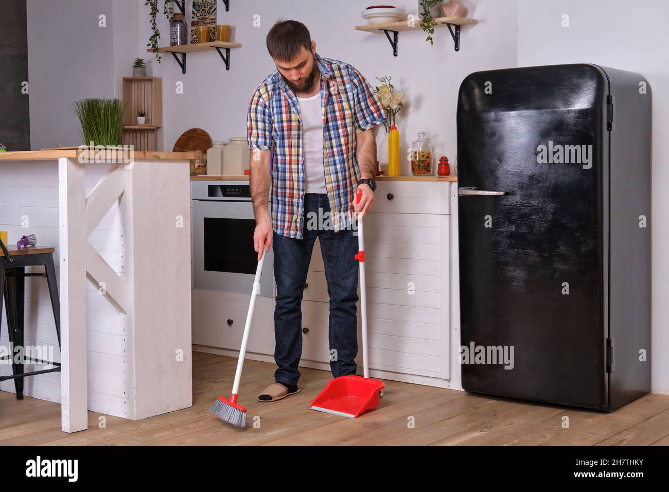 Sweeping mopping floor kitchen hi-res stock photography and images - Alamy