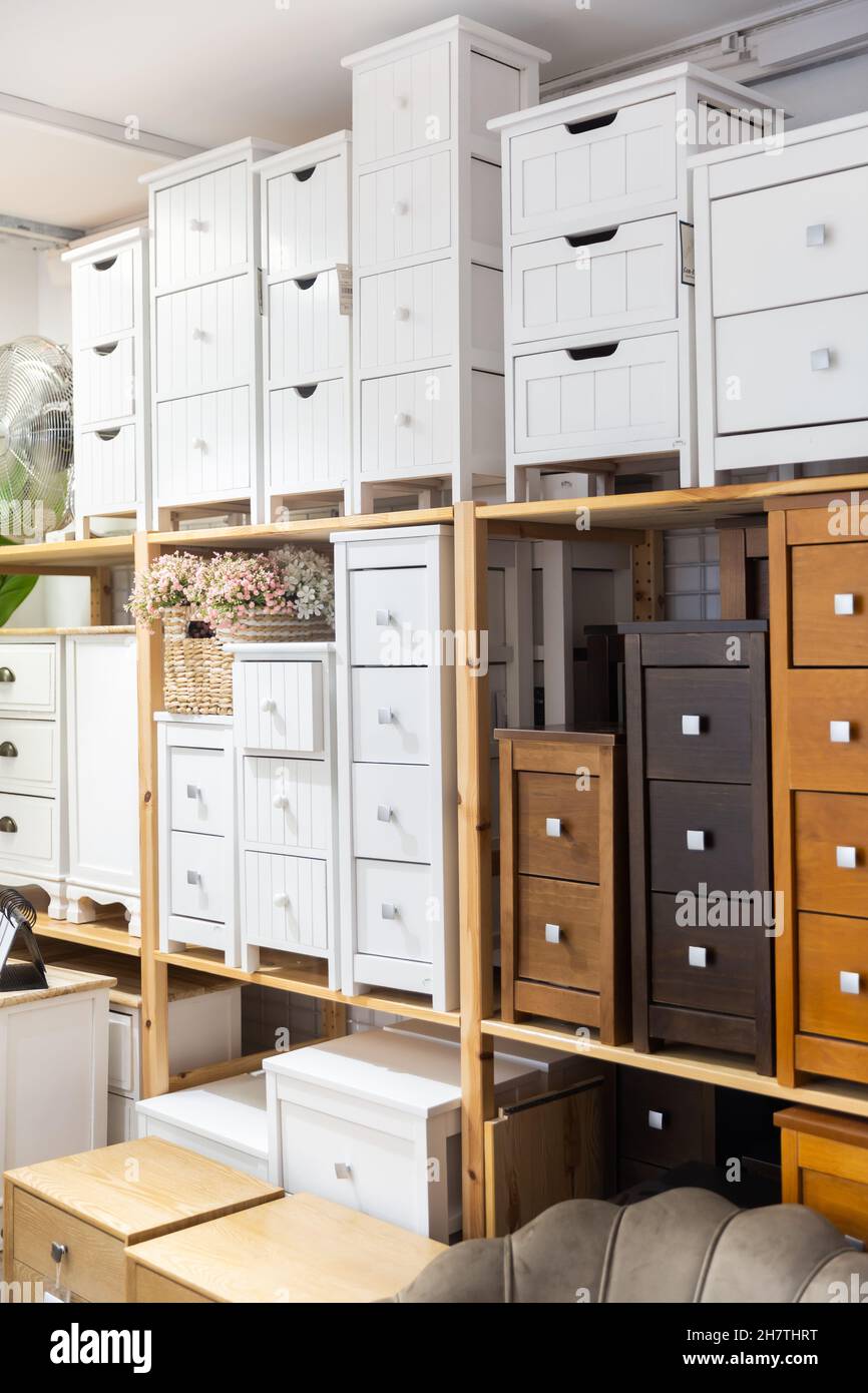 Wooden chests of drawers in a store Stock Photo - Alamy