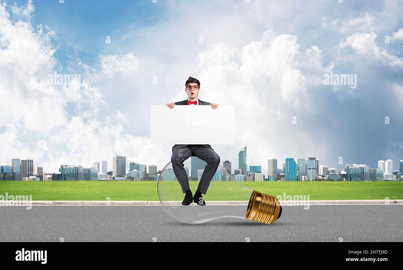businessman with an empty banner Stock Photo - Alamy