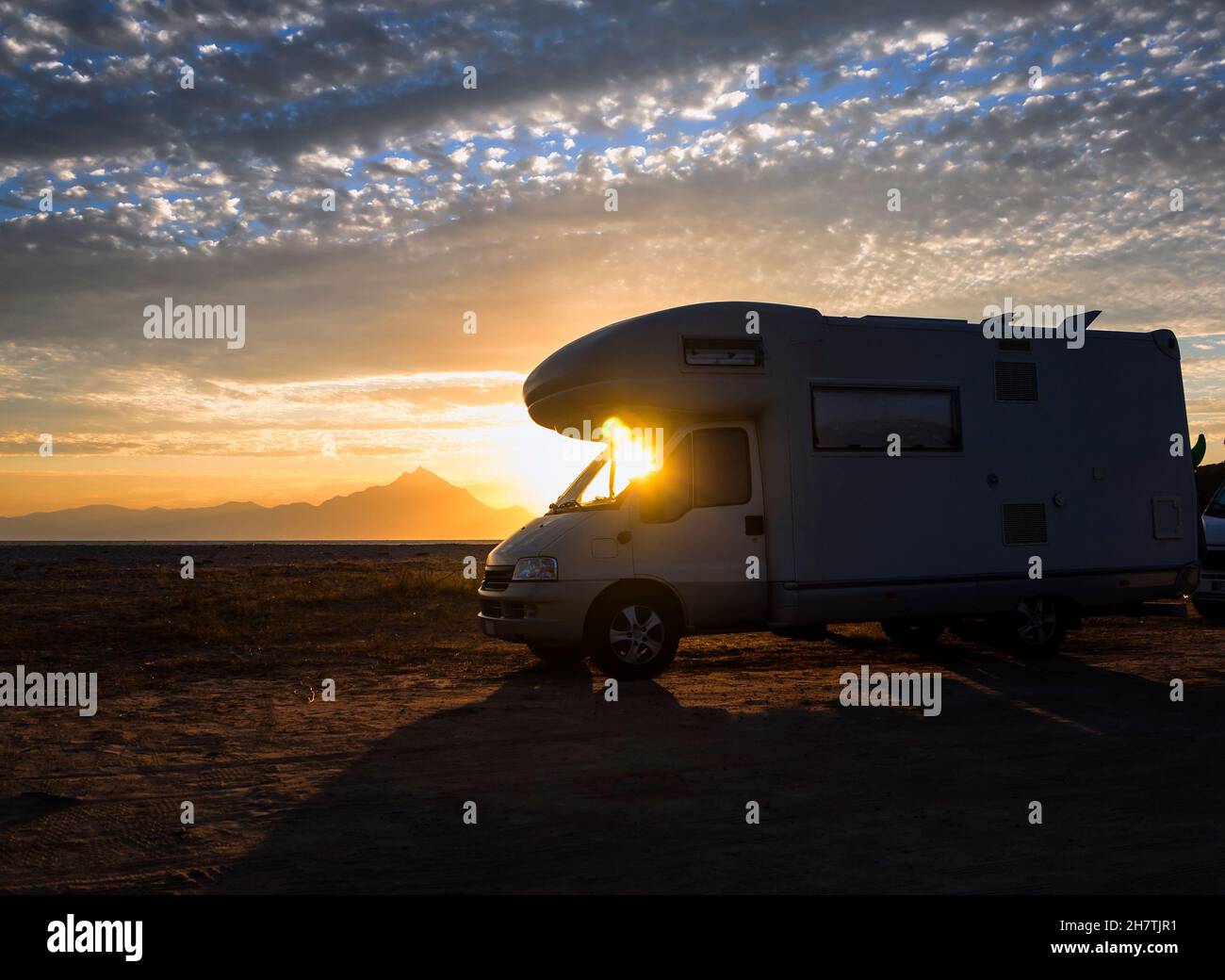 RV Camper On the Beach At Sunset Stock Photo - Alamy