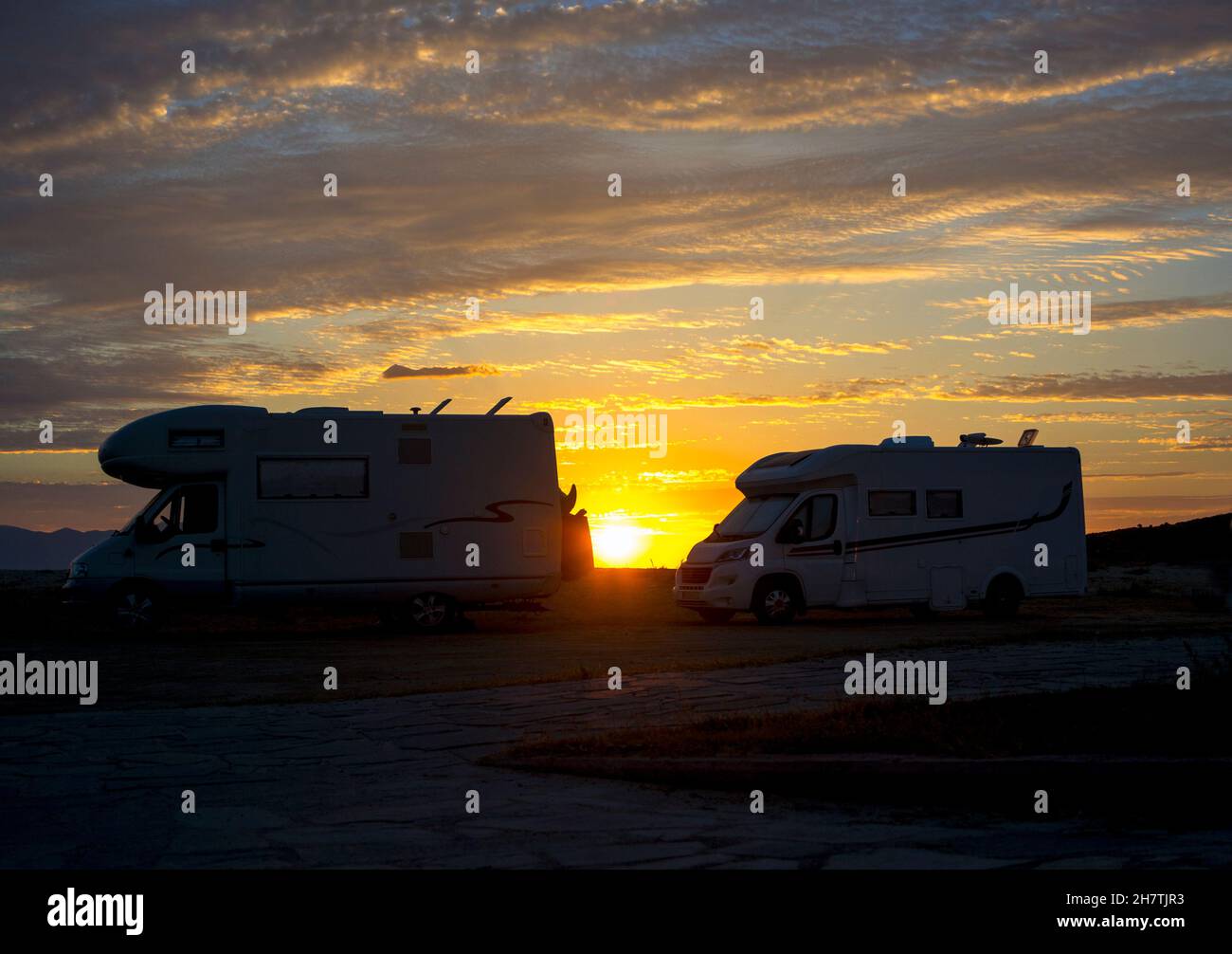 RV Campers On the Beach At Sunset Stock Photo - Alamy
