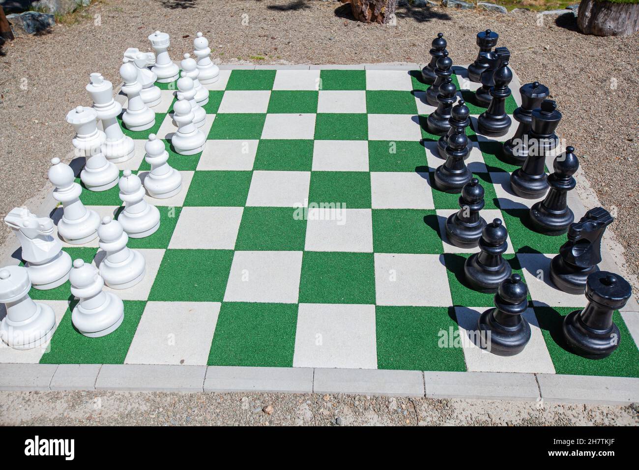 Giant outdoor chess set in park Stock Photo - Alamy