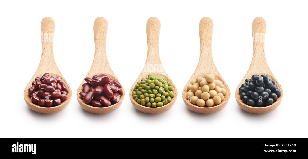 Wooden spoon filled with various type of beans over white background ...