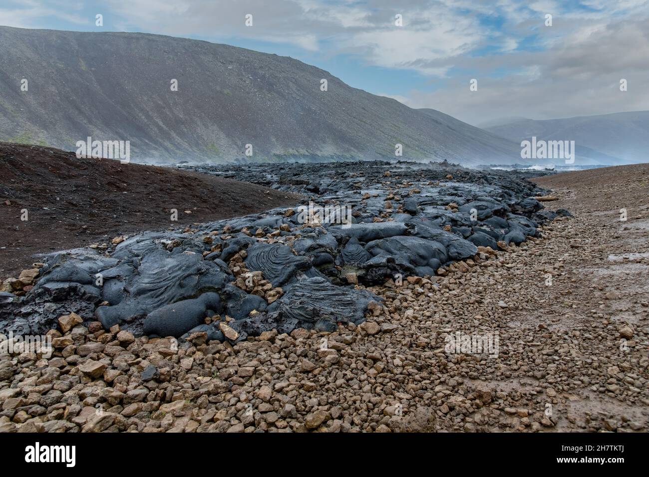 Close up view of black lava crust or ingenious rock, cooled down from ...