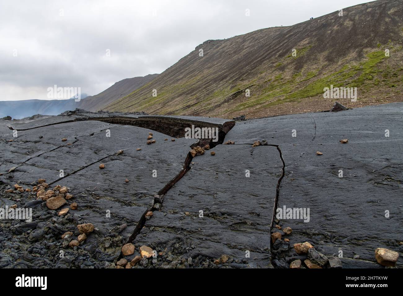 Close up view of cracked lava crust or ingenious rock, cooled down from ...