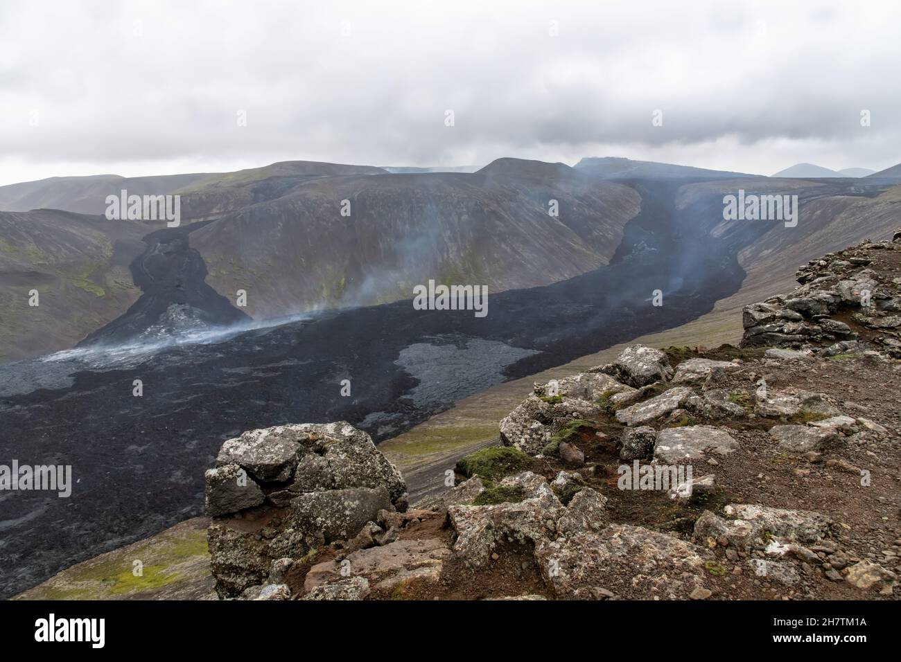 High angle view of black lava crust or ingenious rock, cooled down from ...