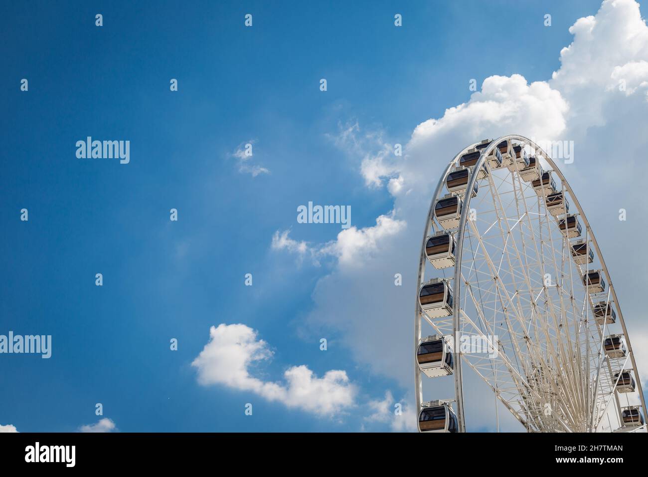White big Ferris wheel with blue sky sharp clouds background Stock ...