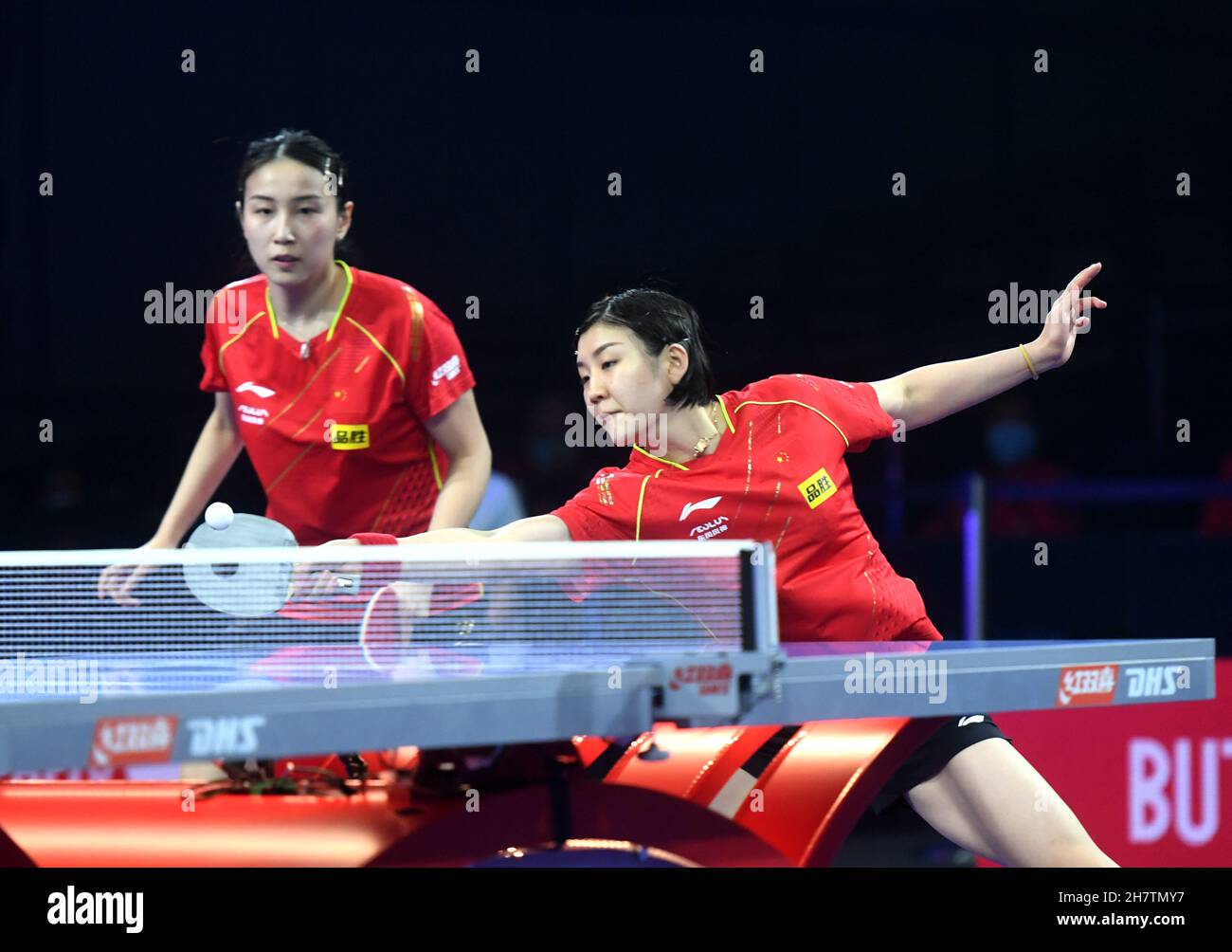 Houston. 24th Nov, 2021. Qian Tianyi (L)/Chen Meng compete during the ...