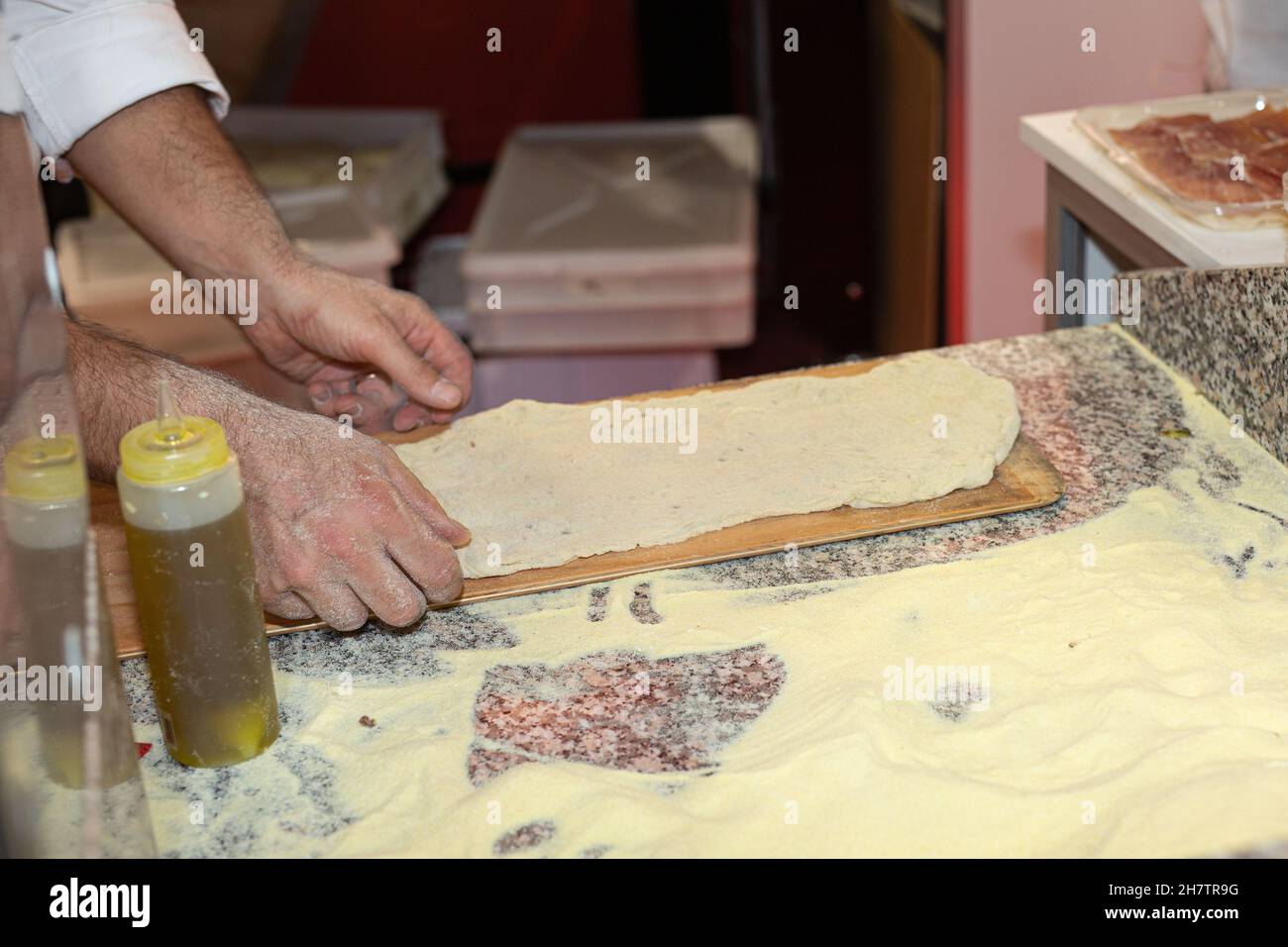 Chef Preparing Italian Pizza inside a Restaurant Stock Photo - Alamy