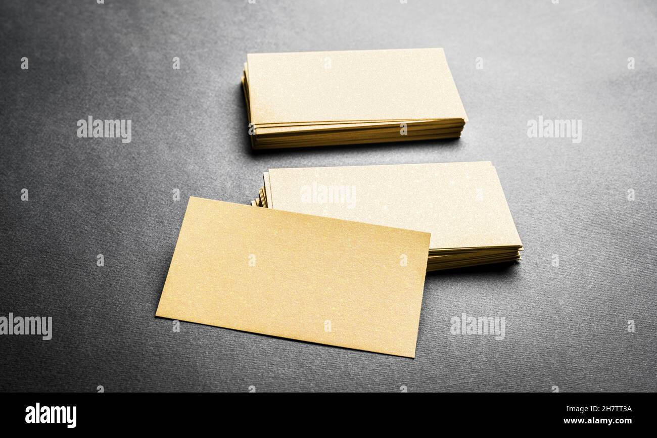 Blank golden business card on grey background Stock Photo - Alamy