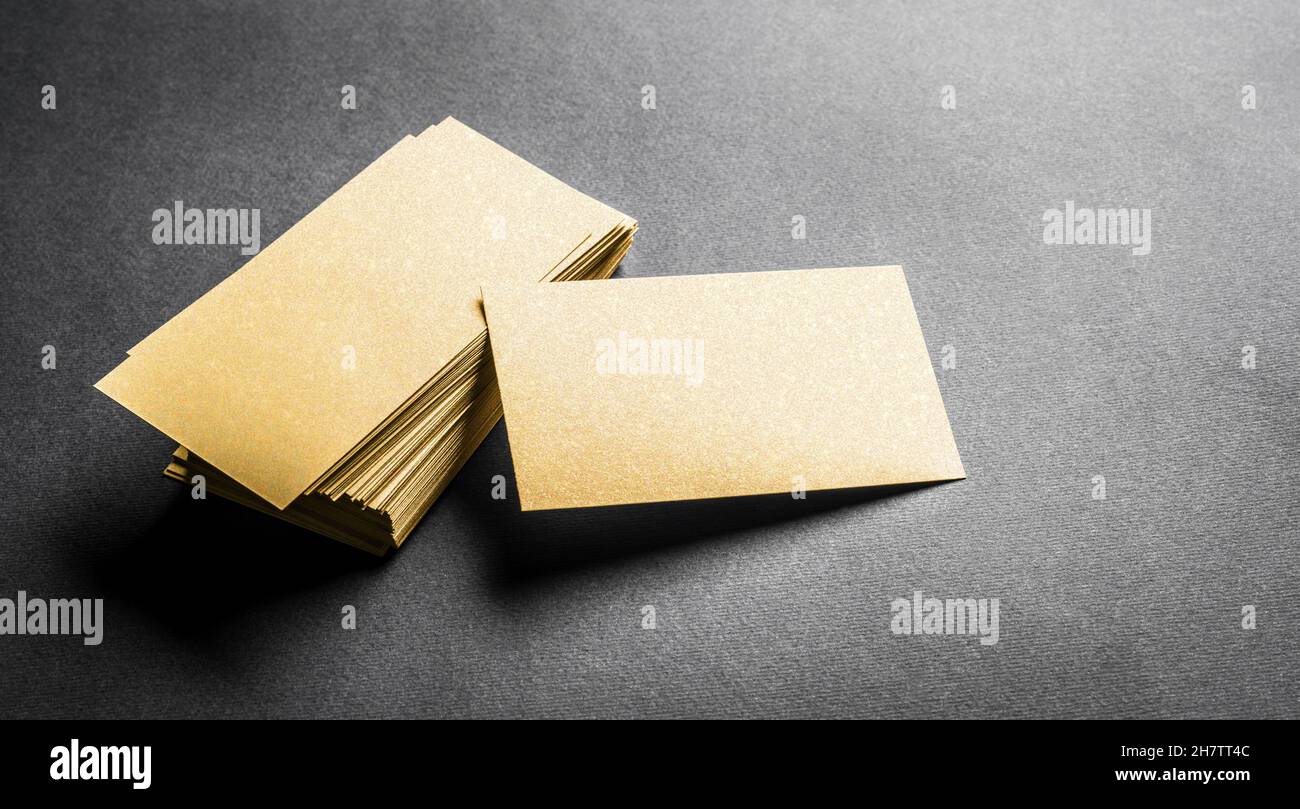 Blank golden business card on grey background Stock Photo - Alamy