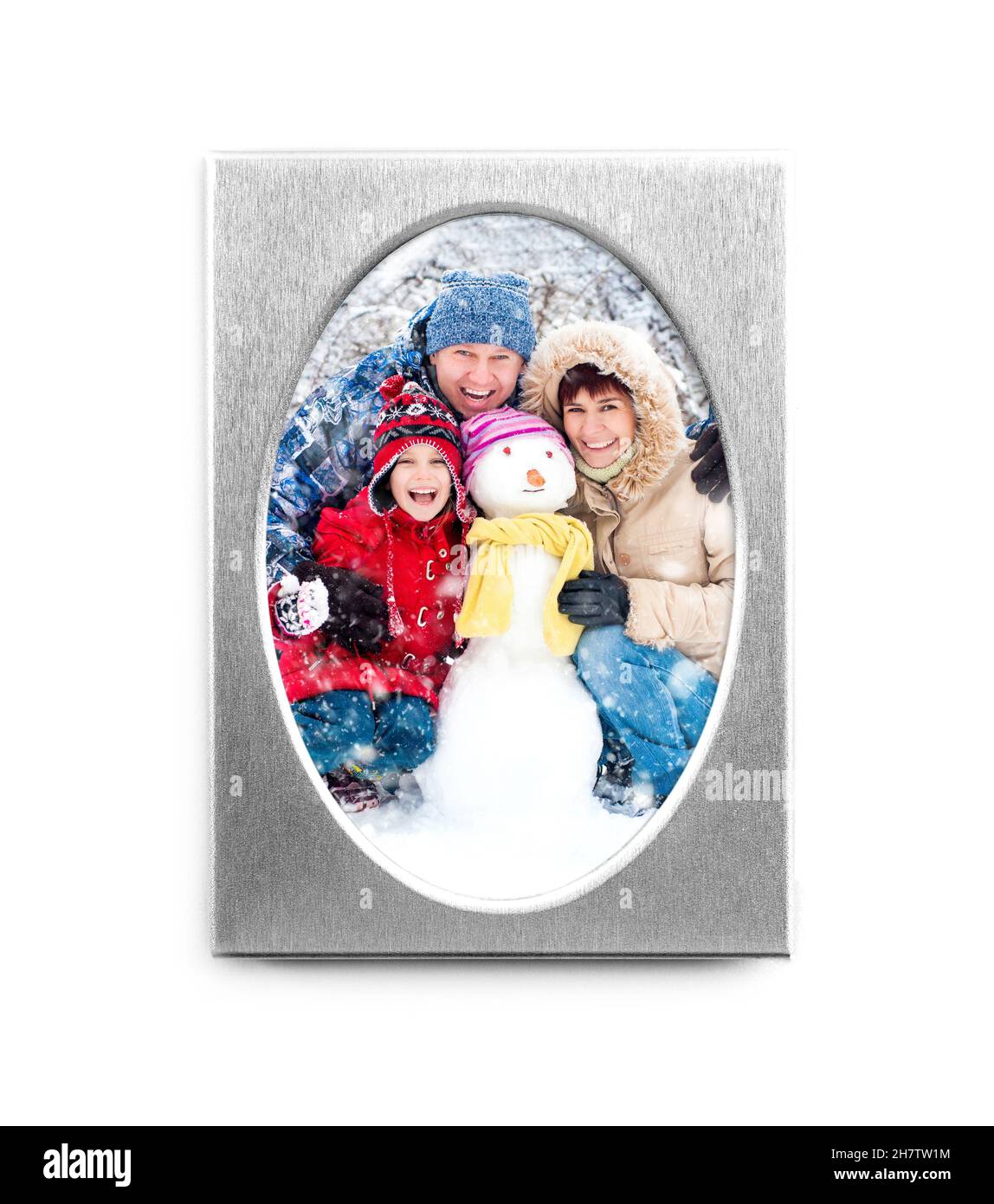 Silver frame with happy family photo Stock Photo - Alamy