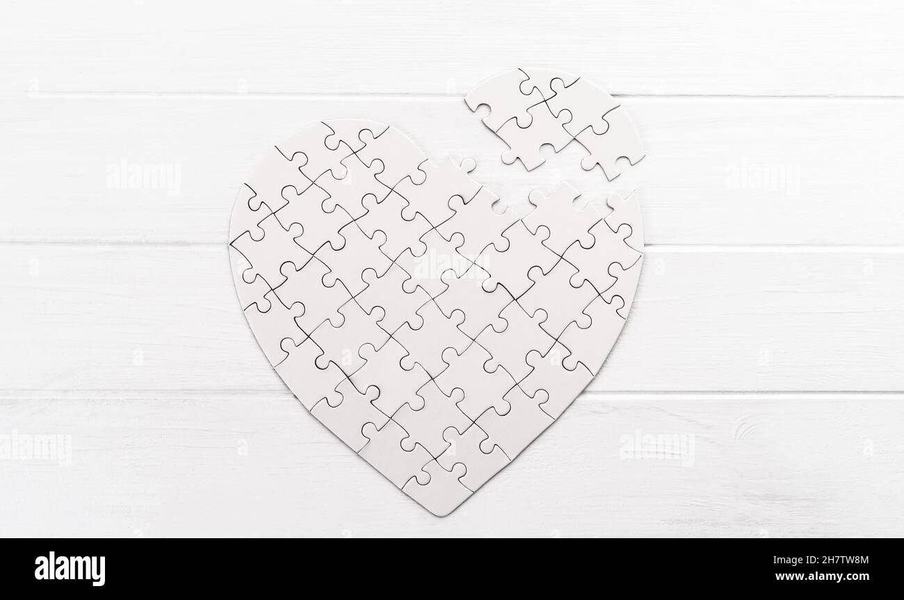 Jigsaw puzzle heart Stock Photo - Alamy