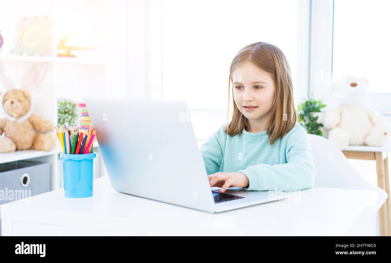 Beautiful girl working on laptop Stock Photo - Alamy