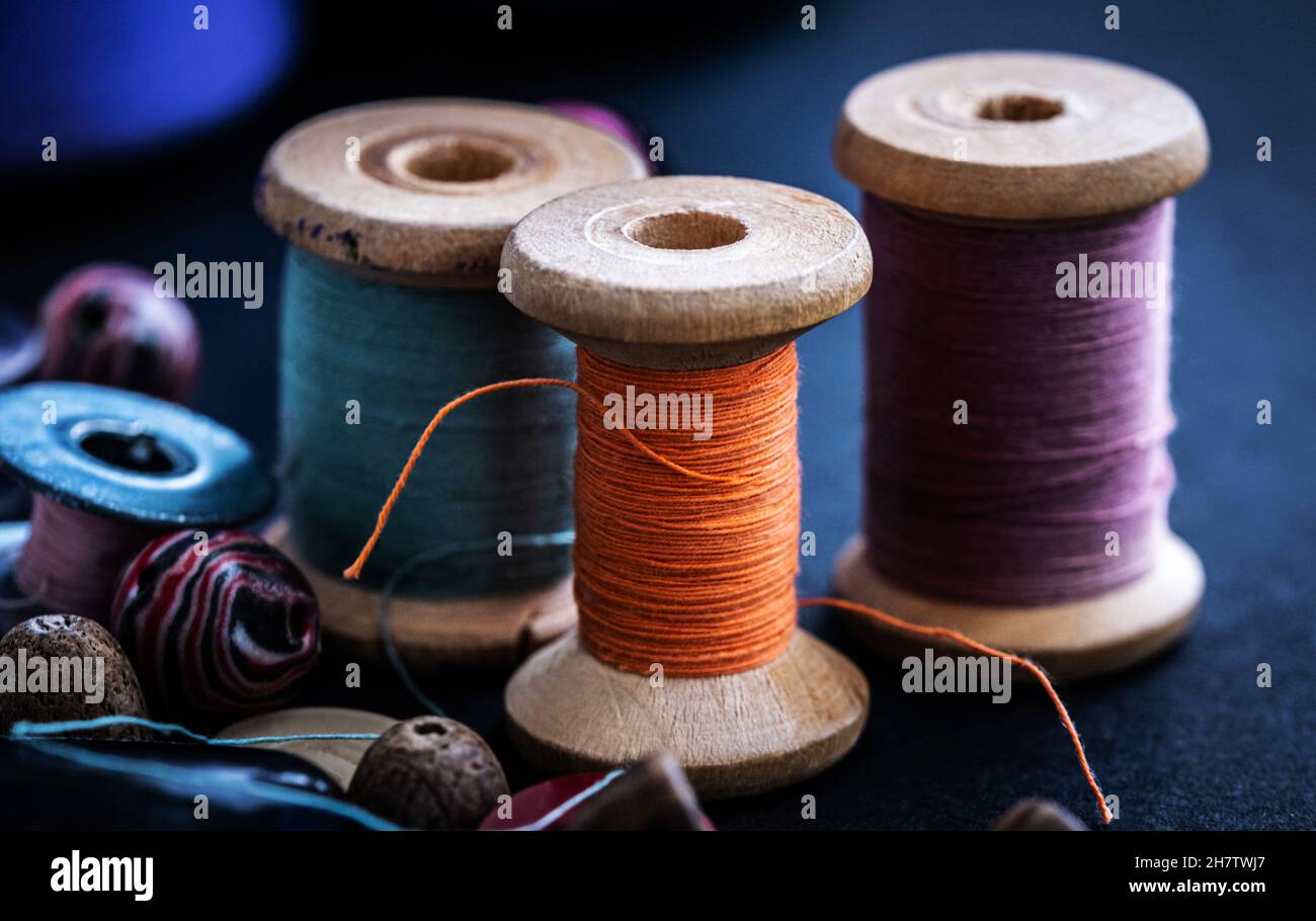 Vintage wooden bobbins hi-res stock photography and images - Alamy