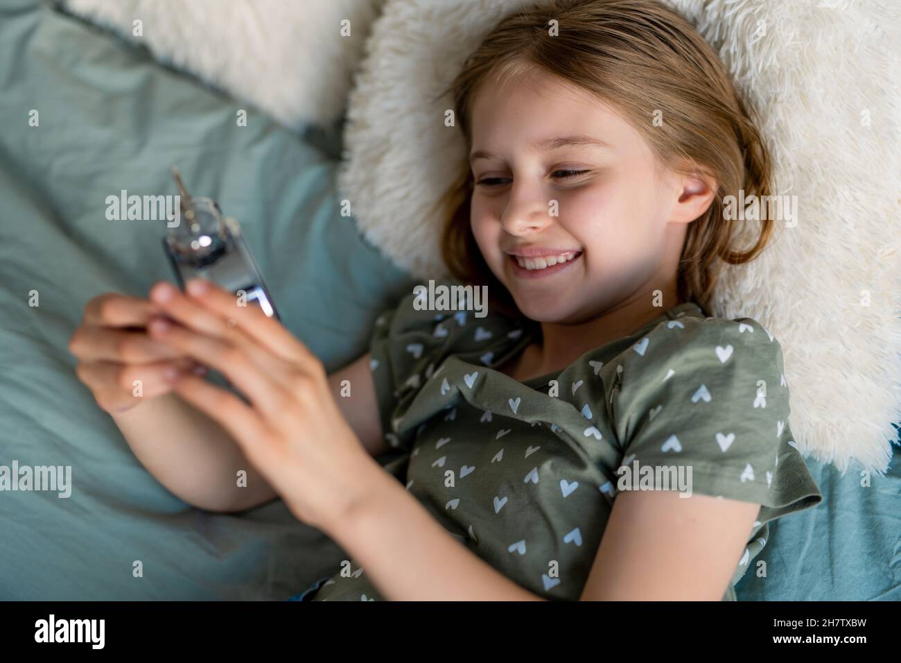 Portrait of preteen girl indoors Stock Photo - Alamy