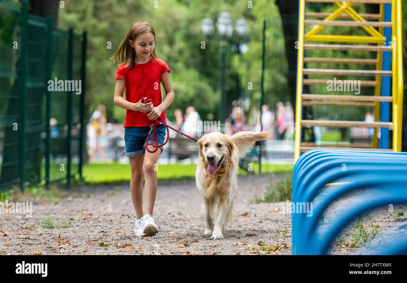 Child training dog hi-res stock photography and images - Alamy