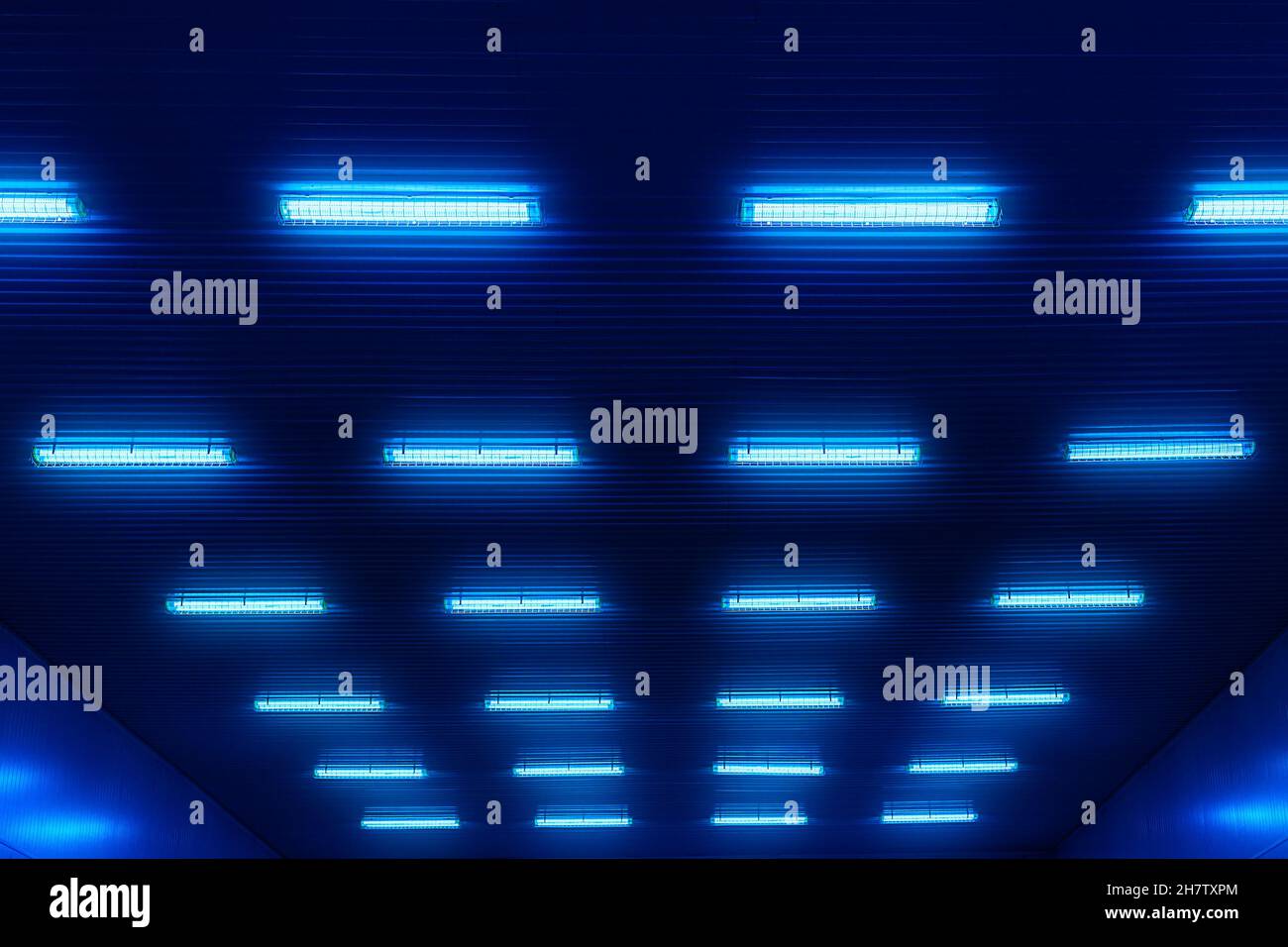 Abstract futuristic background. Blue glow from electric lamps. Neon ...