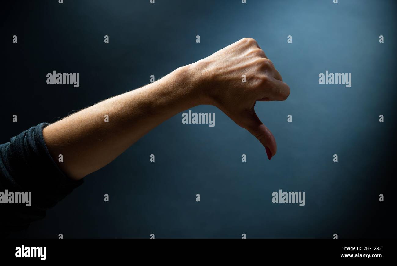Hand shows signs with fingers Stock Photo - Alamy