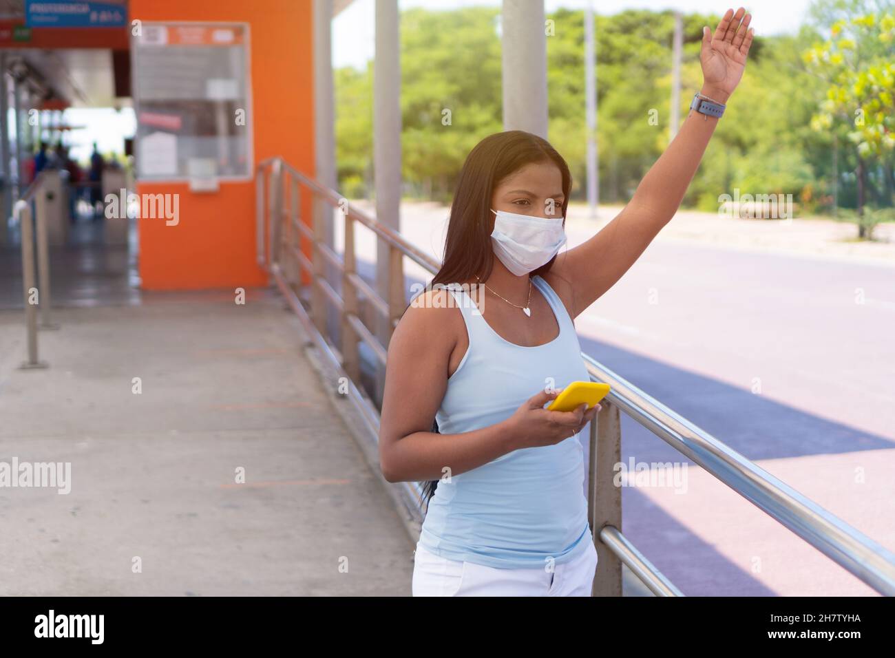 Hailing bus hi-res stock photography and images - Alamy