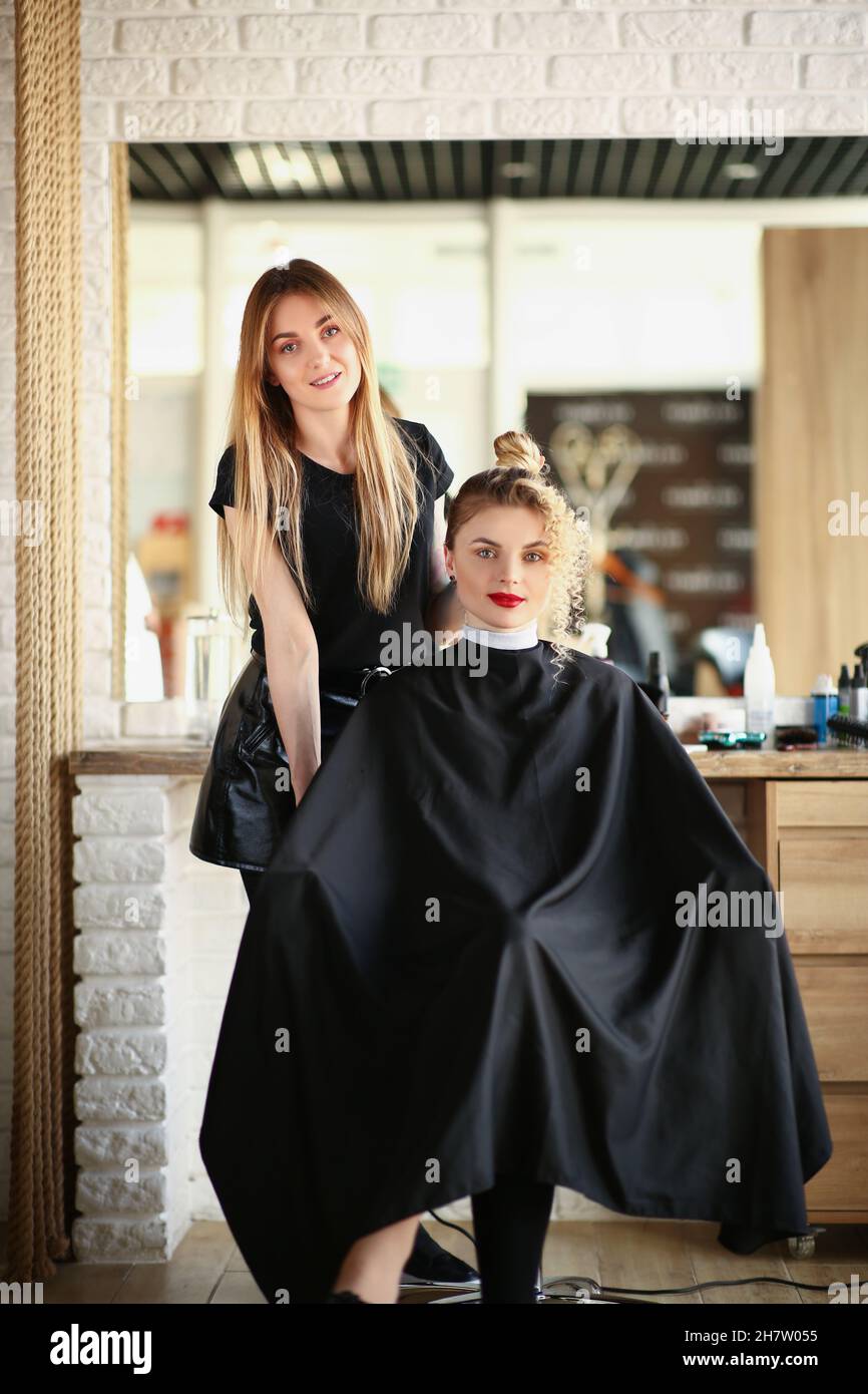 Master and client working on creating stunning image for evening party ...