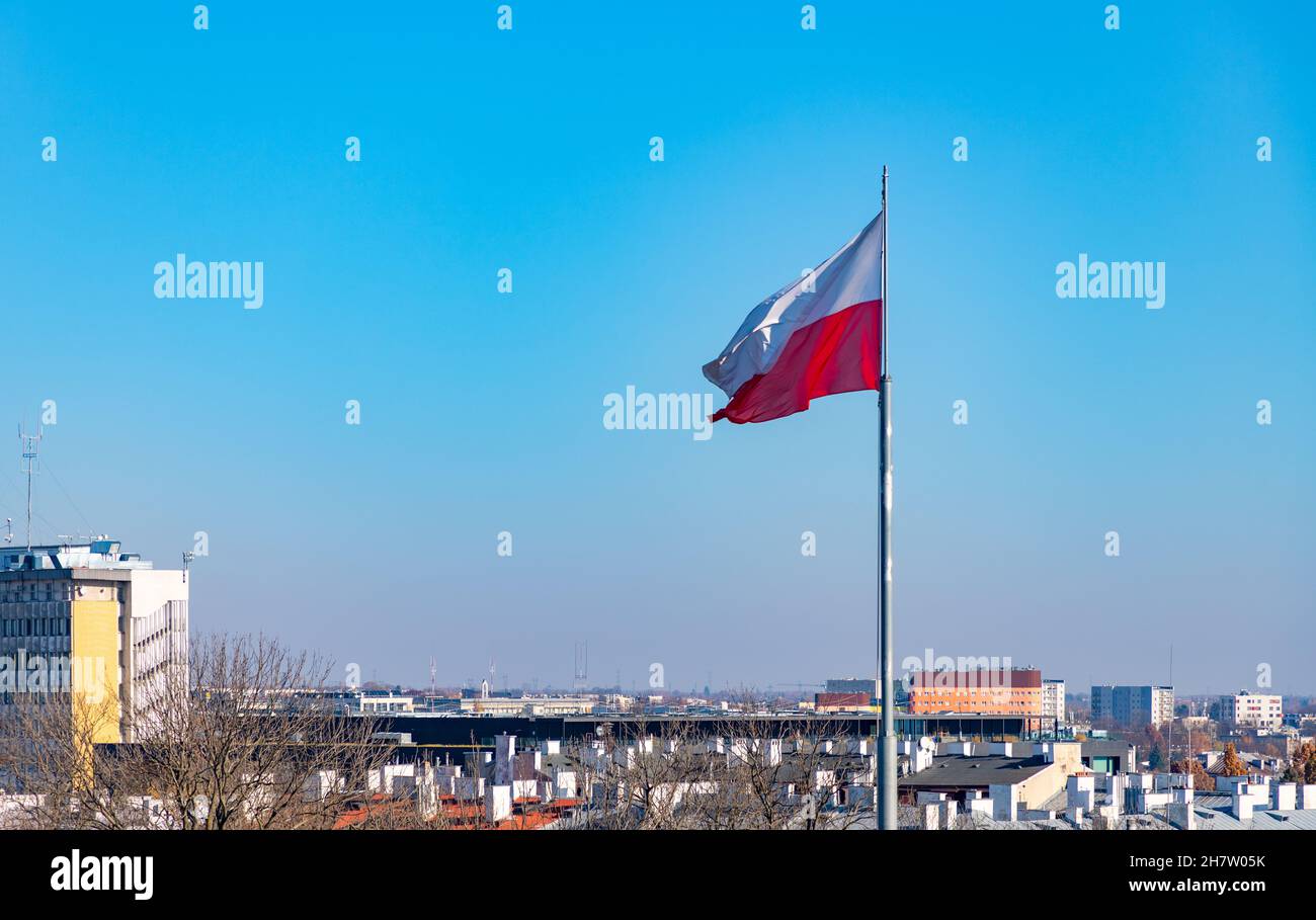 A picture of the Polish flag atop of a building in Lublin Stock Photo ...