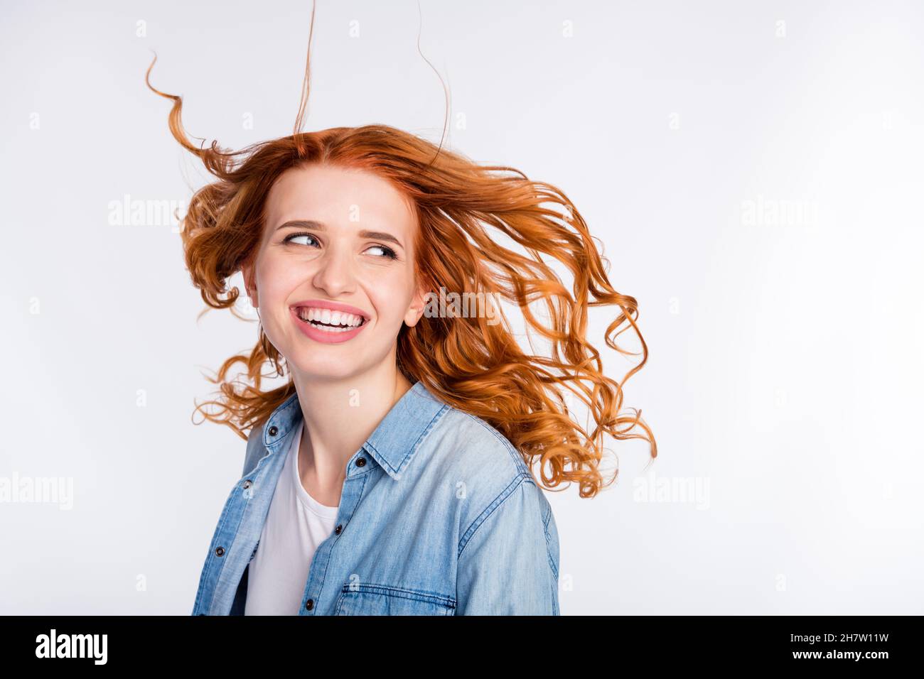 Photo of dreamy positive charming woman look empty space smile wind ...