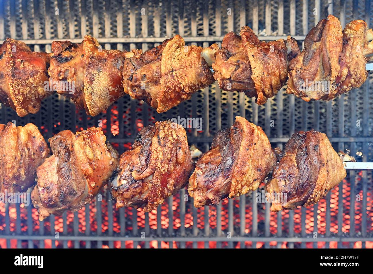 Munich, Deutschland. 24th Nov, 2021. Pork knuckles are grilled crispy ...