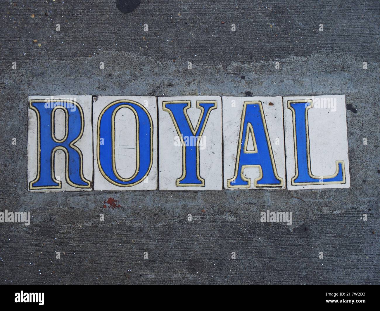 Word "ROYAL" is composed on the asphalt; Royal Street in the French ...