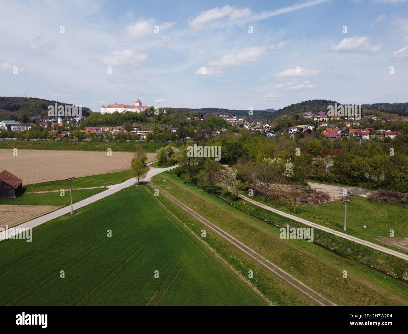 Aerial view of an agricultural field and village buildings in Bavaria ...