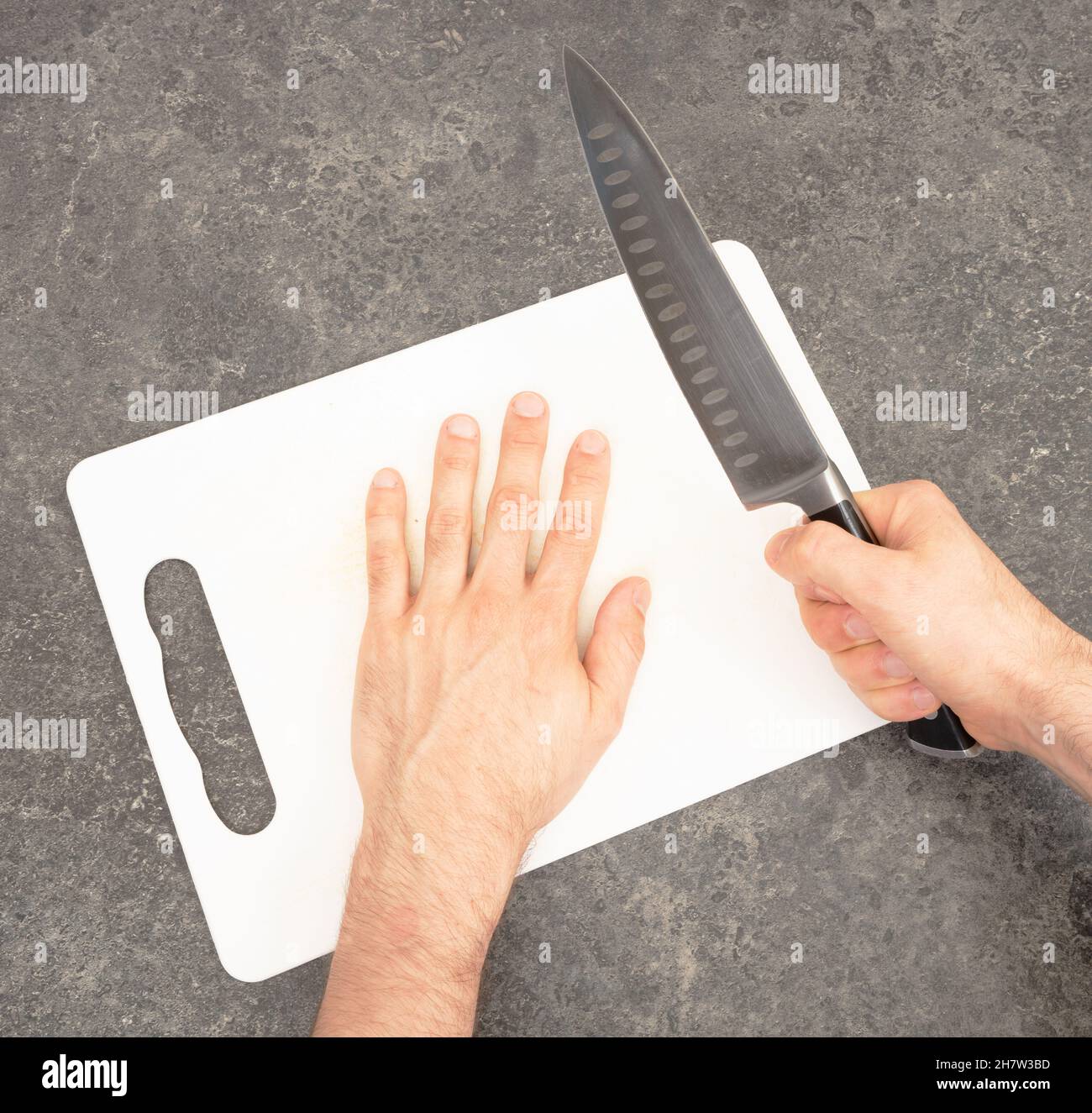 Cutting the fingers with knife - Preparation - Isolated on white Stock ...