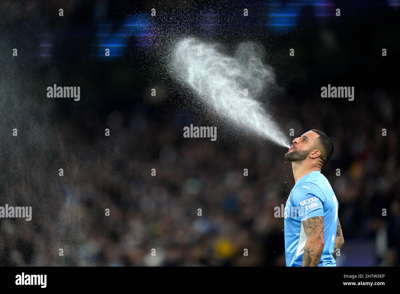 Manchester City's Kyle Walker spits water from his mouth before the ...