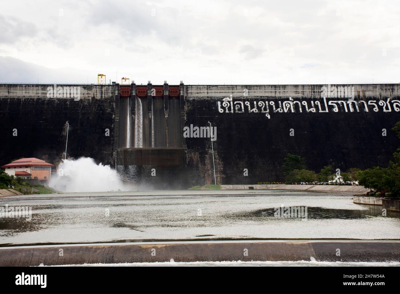 Khun Dan Prakan Chon Dam or Khlong Tha-Dan Barrage Dam while draining ...