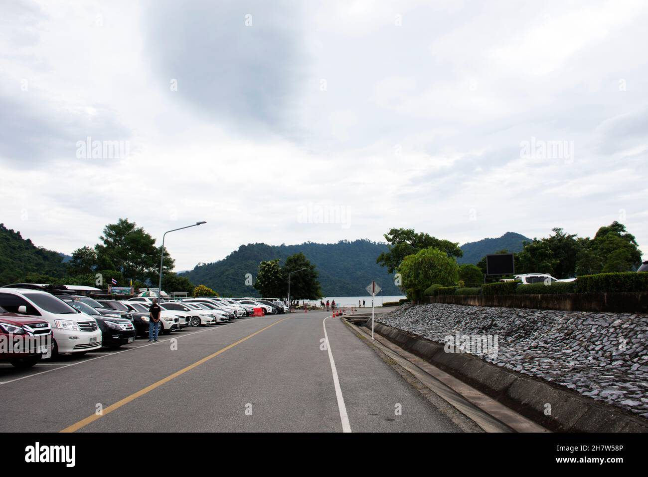 Thai people and foreign travelers stop car at parking for travel visit ...