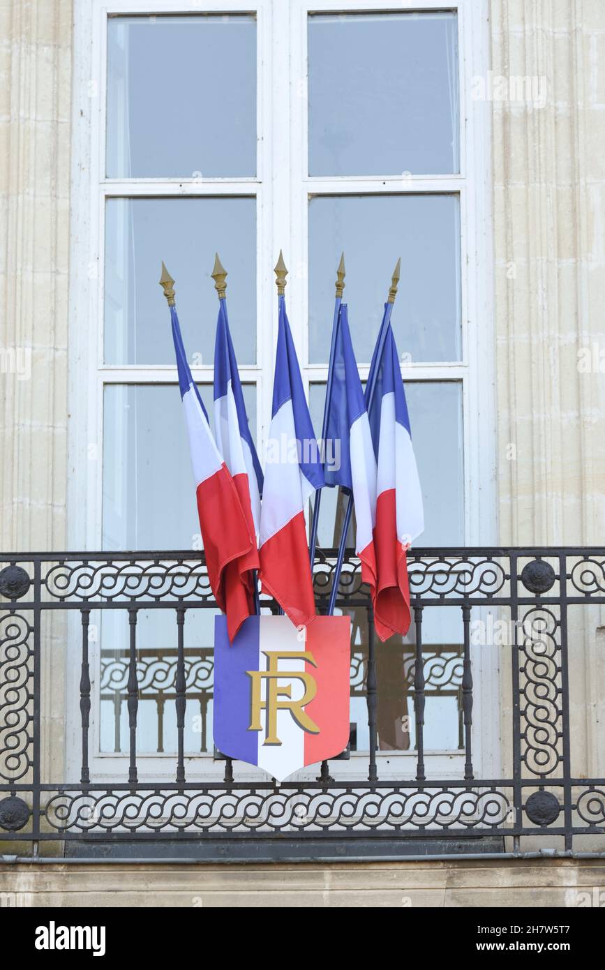 The French flag hung on the tenement house, waving in the wind Stock ...