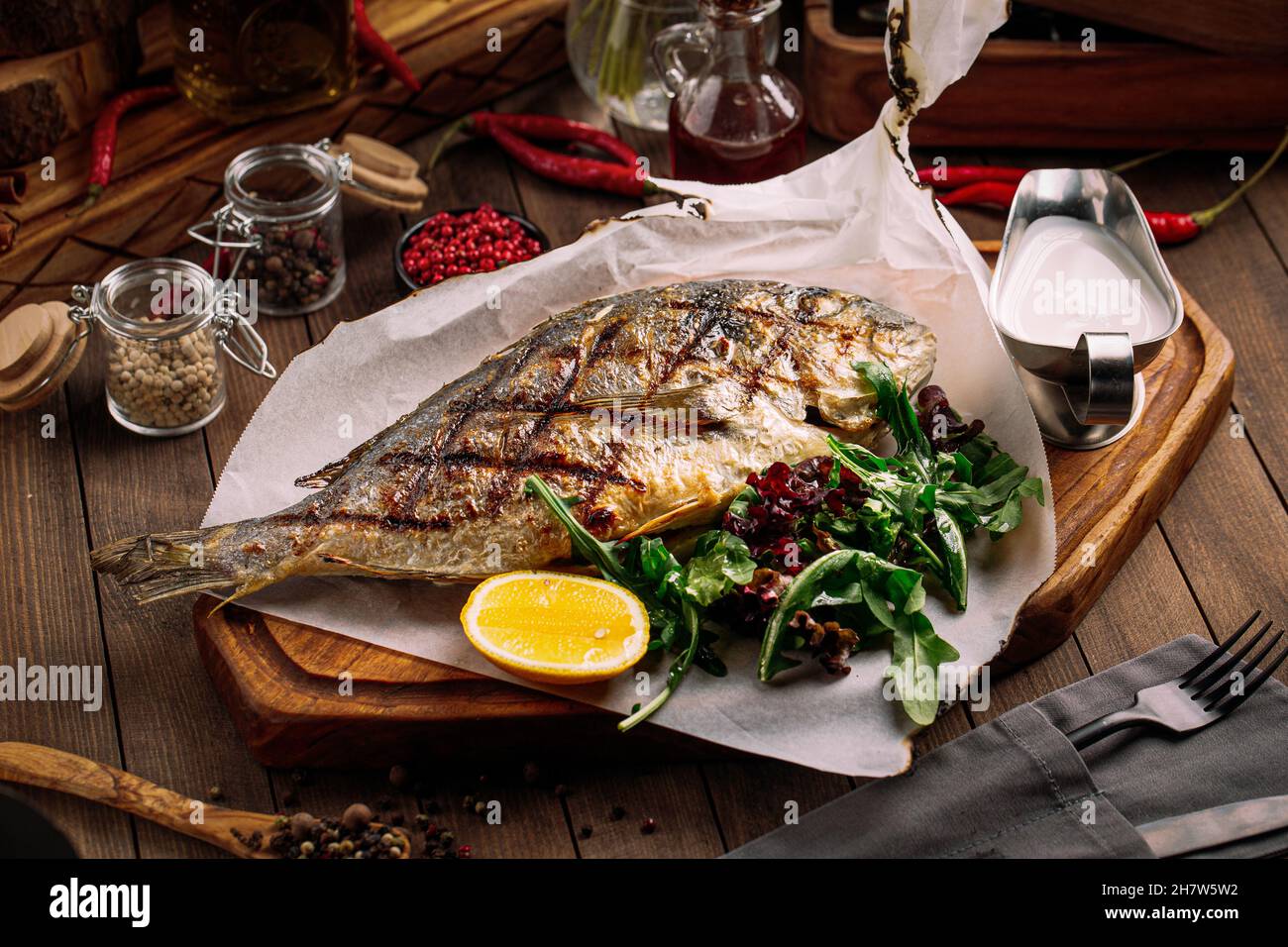 Roasted fish dorado hi-res stock photography and images - Alamy
