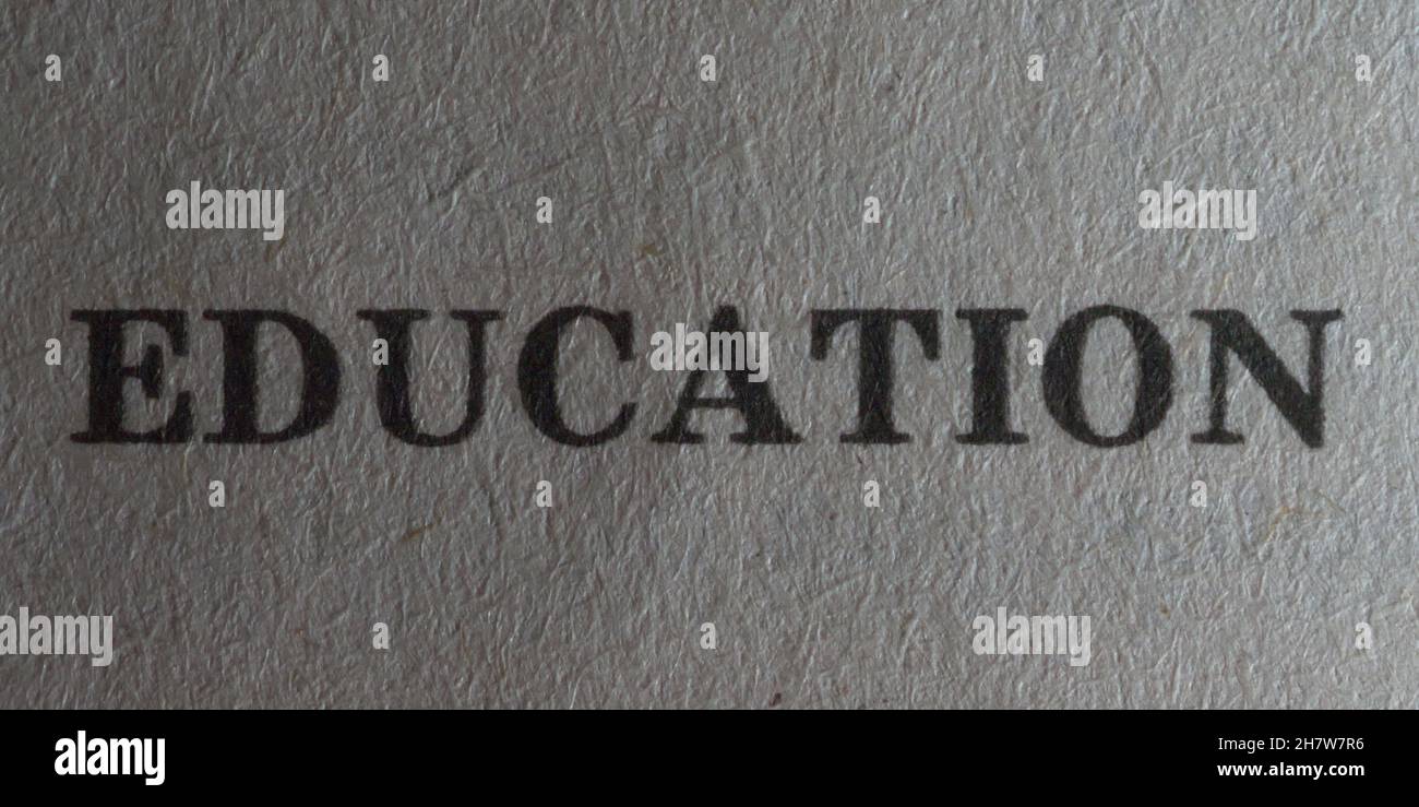 The word "education" is printed on a piece of paper, close-up Stock ...