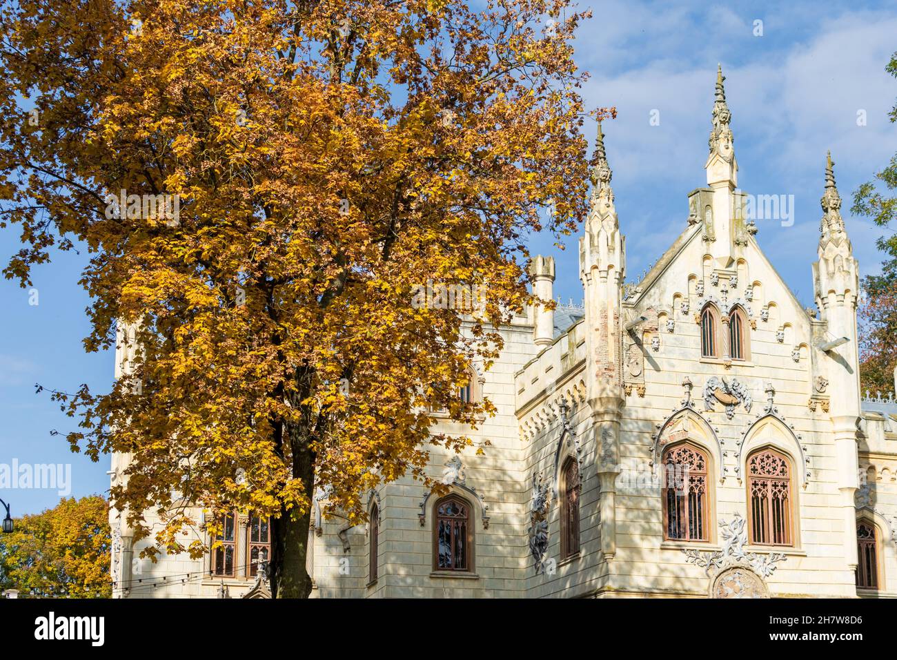 The Miclauseni Castle shaded by autumn colors, Romania Stock Photo - Alamy