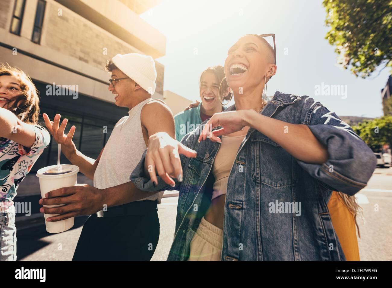 City friends having fun together. Group of generation z friends ...